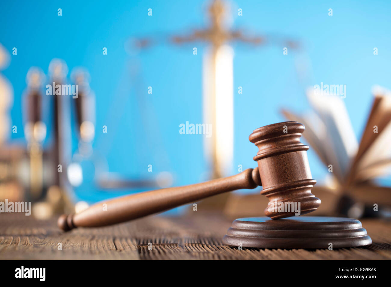 Judge concept. Mallet of the judge, justice scale and books on wooden ...