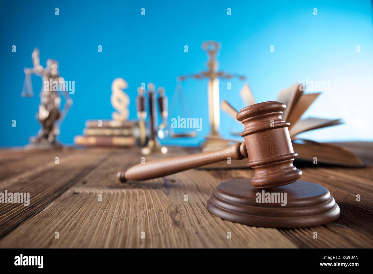 Judge concept. Mallet of the judge, justice scale and books on wooden ...