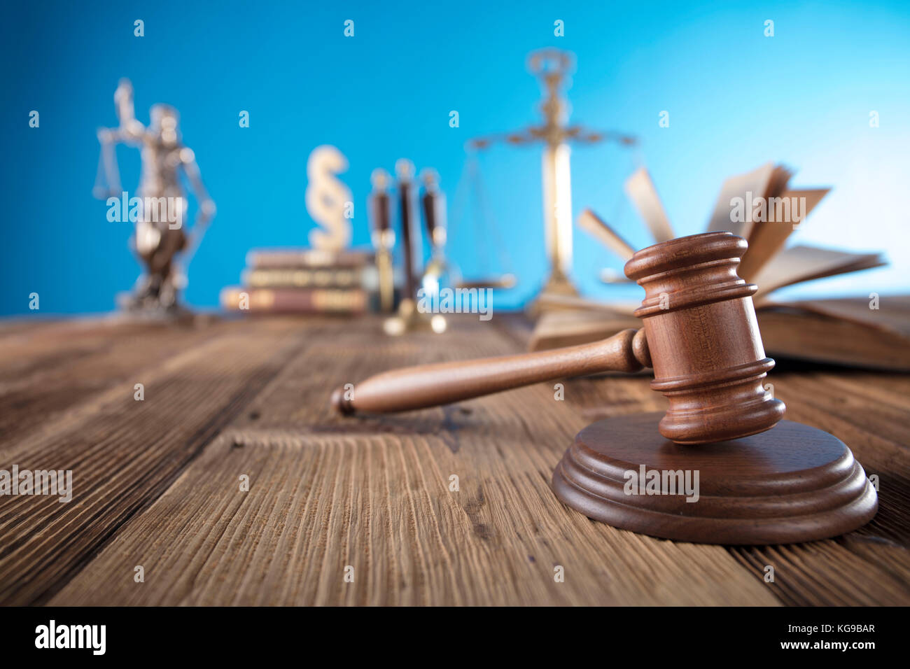 Judge concept. Mallet of the judge, justice scale and books on wooden ...