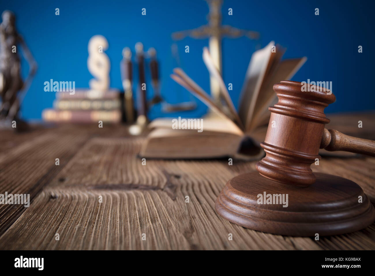 Judge concept. Mallet of the judge, justice scale and books on wooden ...
