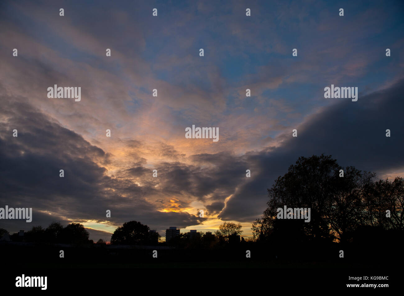 An urban sunset over tower blocks in London Stock Photo - Alamy