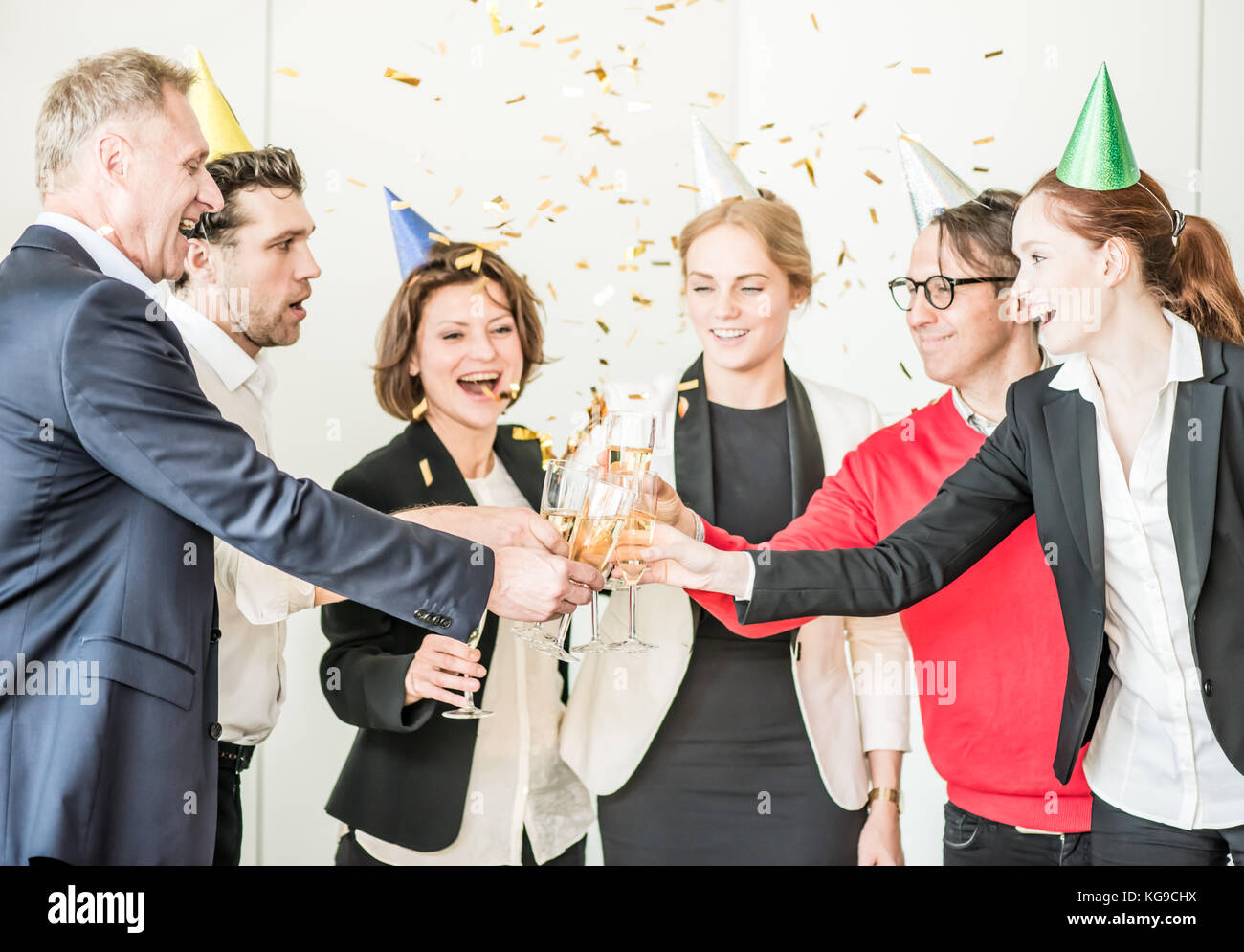 Business people celebrating New Year at office party Stock Photo - Alamy