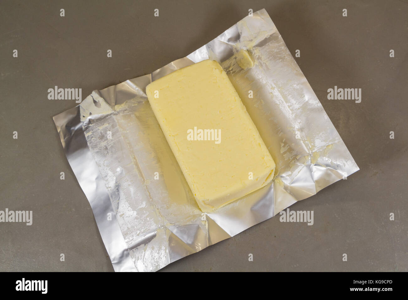 Pack of salted butter unwrapped Stock Photo - Alamy