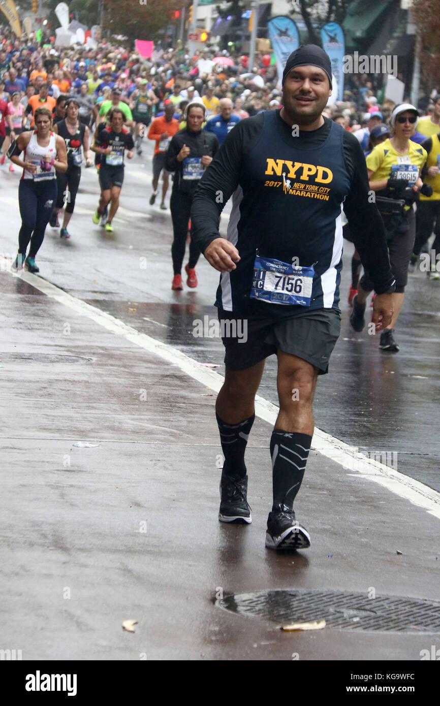 New York City, New York, USA. 4th Nov, 2017. Runners run up 1st Avenue ...