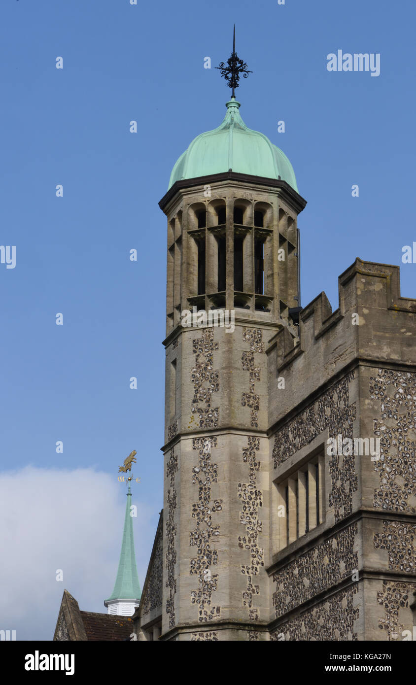 Ornate octagonal sandstone and flint tower of the Winchester Register ...
