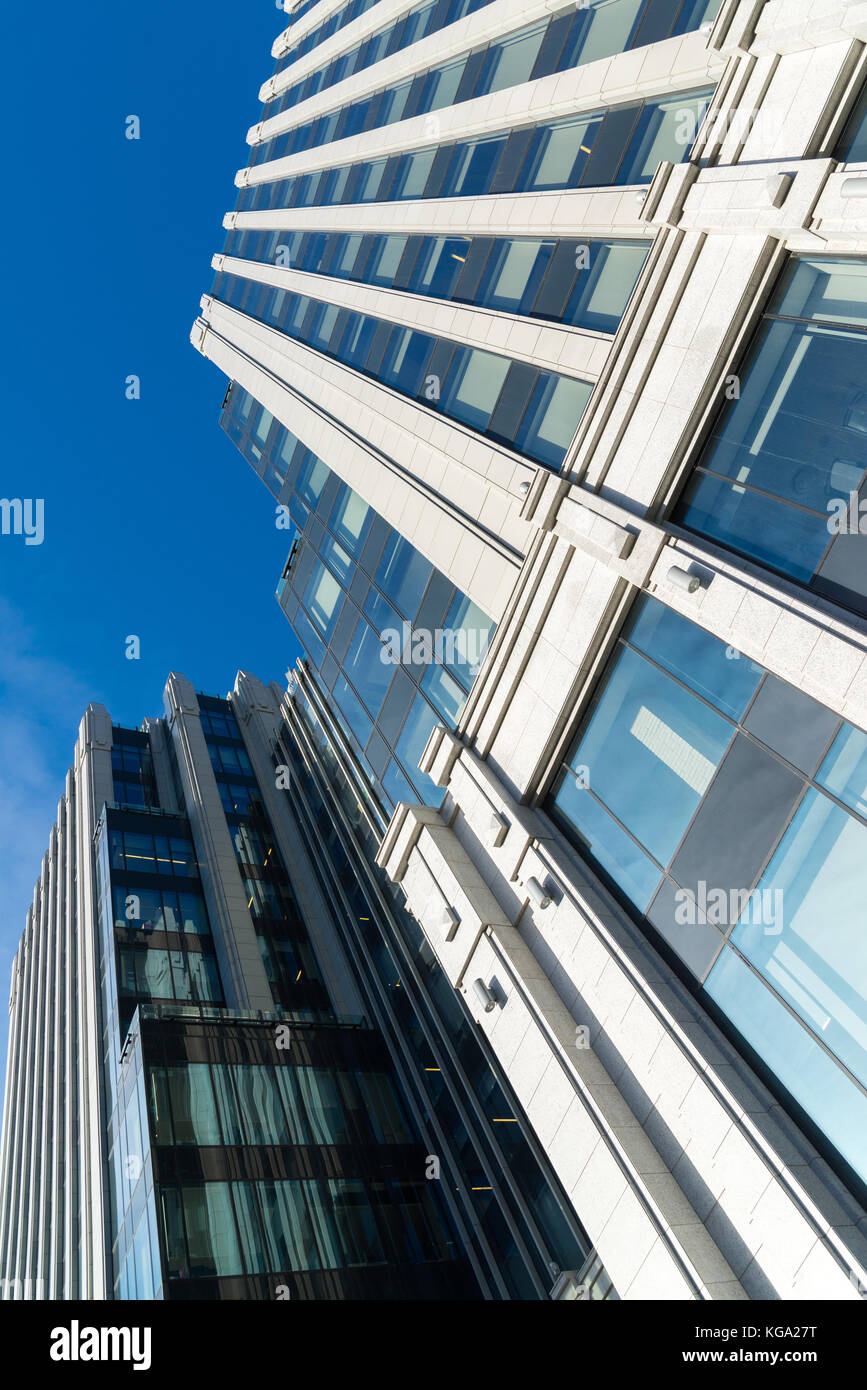 View from below on glass office buildings Stock Photo - Alamy