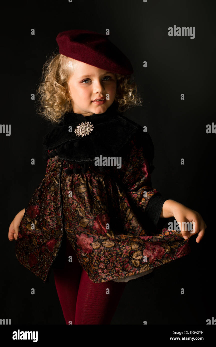 Attractive girl in brown old-fashioned costume Stock Photo - Alamy