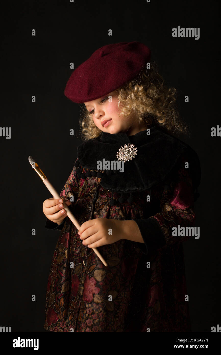 Pretty girl in brown old-fashioned costume Stock Photo - Alamy