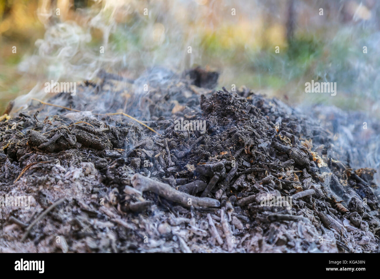 Smoldering fire hi-res stock photography and images - Alamy