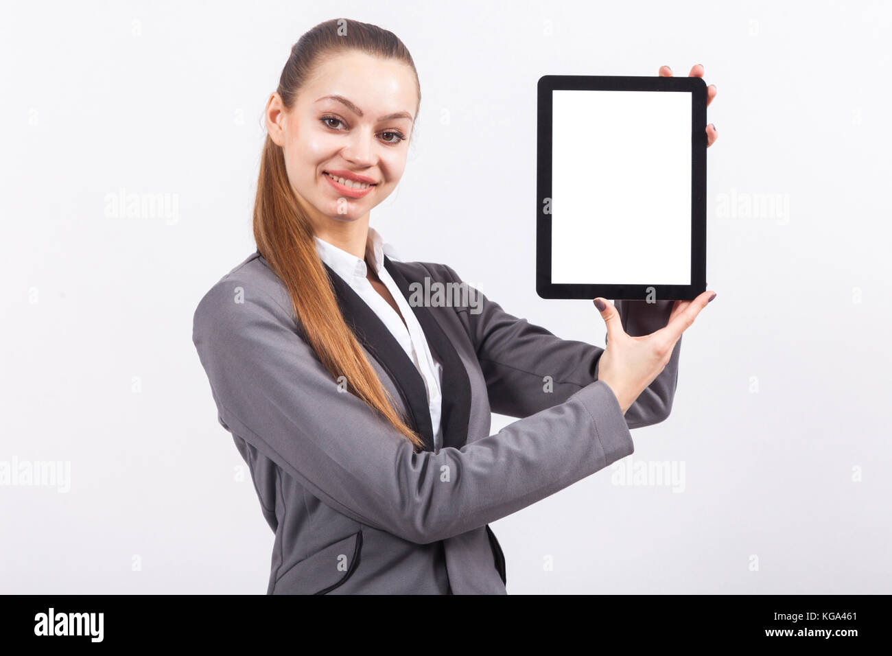 Pretty business lady with tablet Stock Photo - Alamy