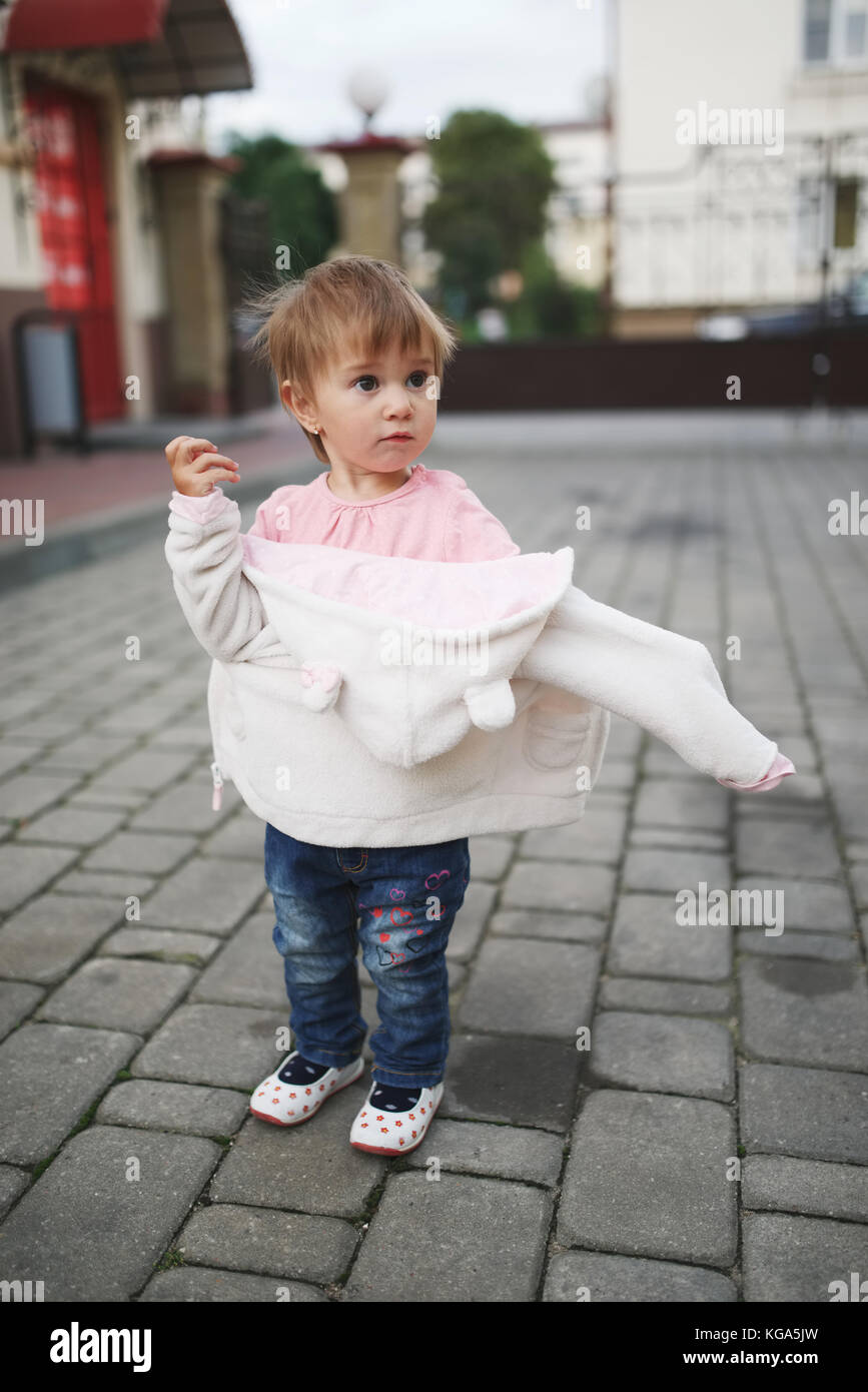 sweet little girl tried to get dressed wrong way Stock Photo - Alamy