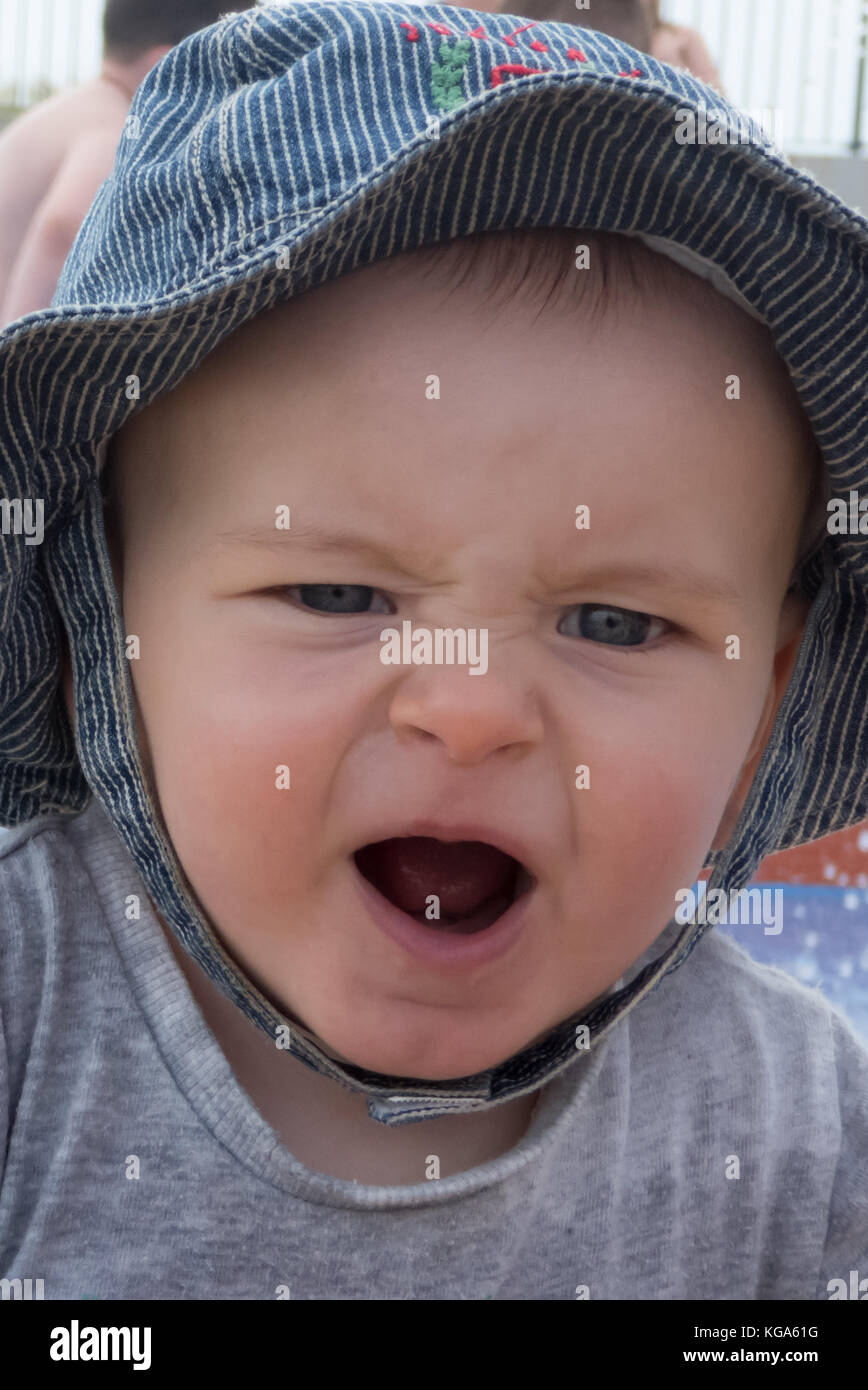 Funny face of baby hi-res stock photography and images - Alamy