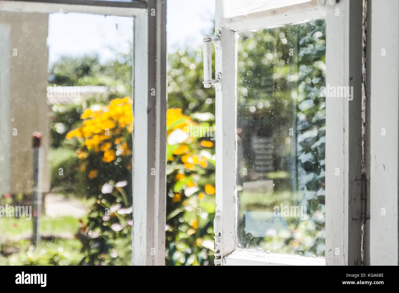 View from an old rural window in a sunny summer courtyard Stock Photo ...