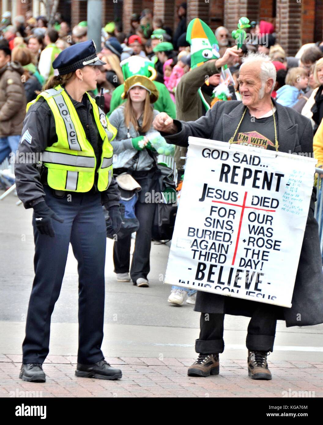 Street Preacher giving Fist Bump to Cop Stock Photo - Alamy