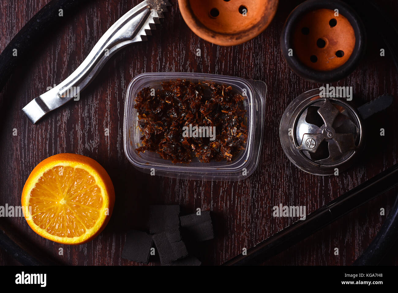 Hookah accessories on the table. Smoking Shisha. Relaxing enviro Stock ...