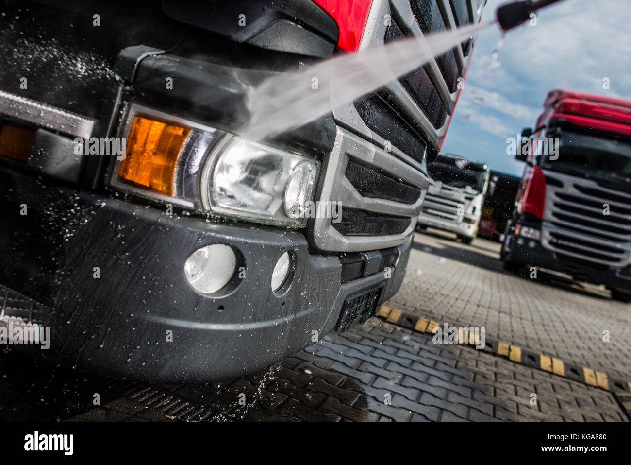 Semi Truck Tractor Washing by High Pressured Water. Keeping Trucks ...
