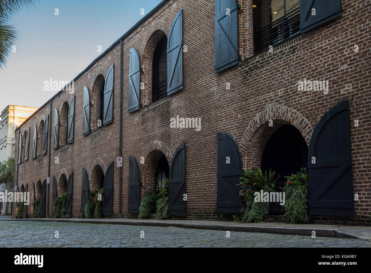 A beautiful historic brick building in Charleston with decorative ...