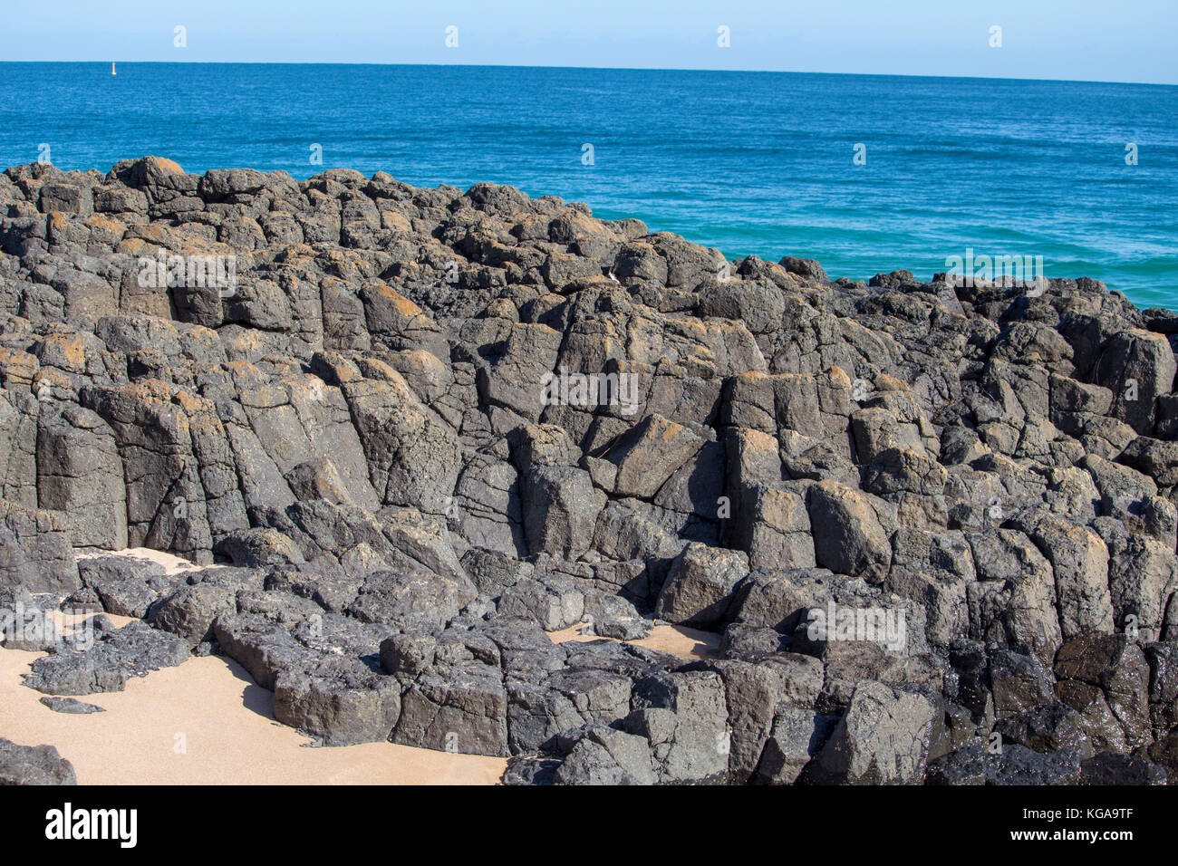 Views of the Indian ocean and basalt rocks from the cycleway in Bunbury ...