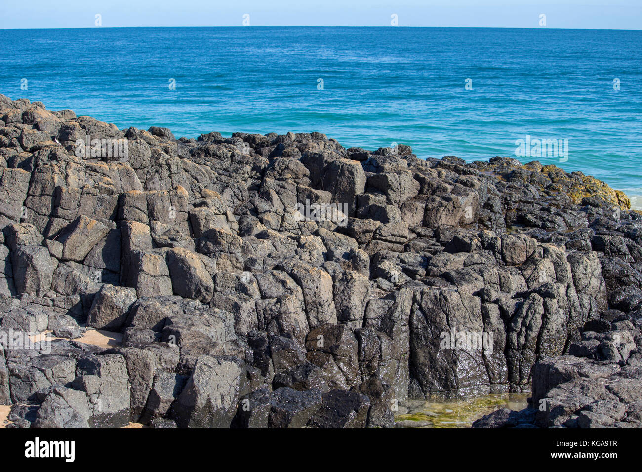 Views of the Indian ocean and basalt rocks from the cycleway in Bunbury ...