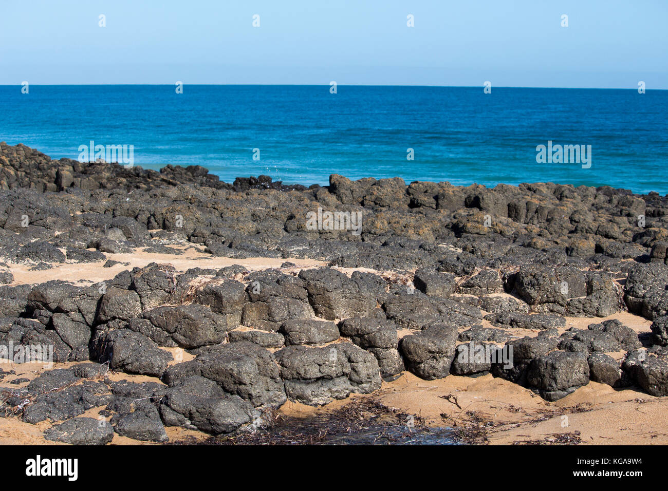 Views of the Indian ocean and basalt rocks from the cycleway in Bunbury ...