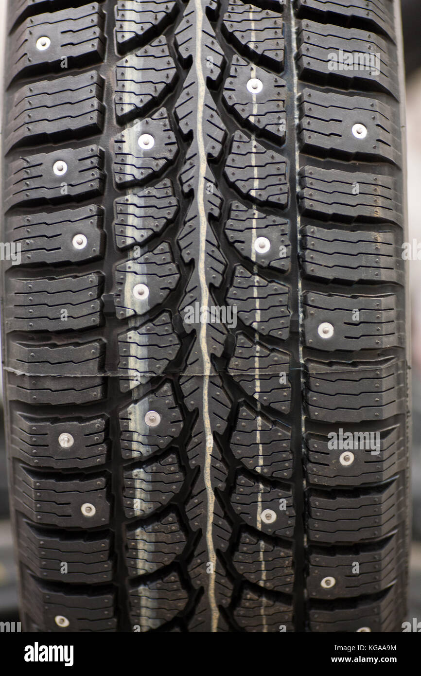 Studded tire on a background close-up Stock Photo - Alamy