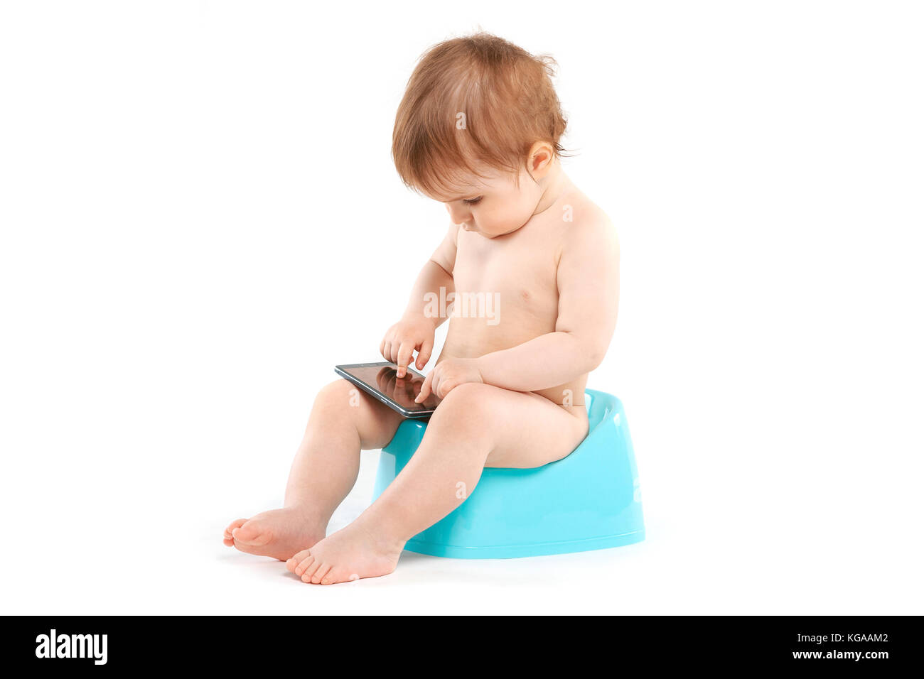 kid on the phone on the potty Stock Photo - Alamy