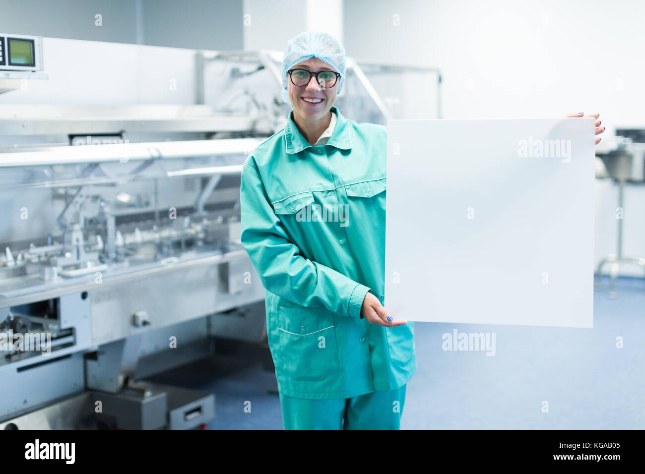pharmaceutical factory worker shows Equipment Stock Photo - Alamy