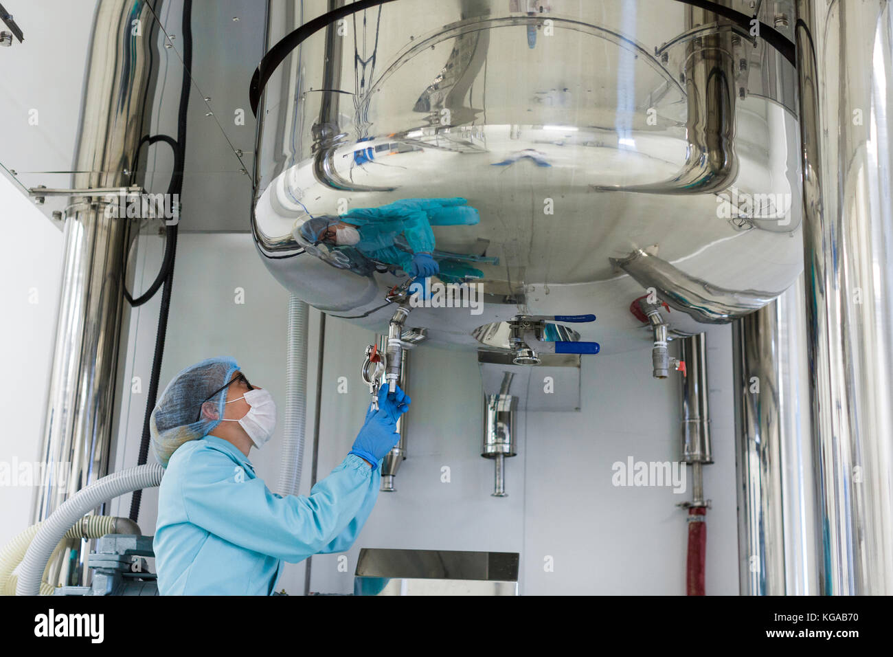 the operator checks the equipment for the production of sterile Stock ...