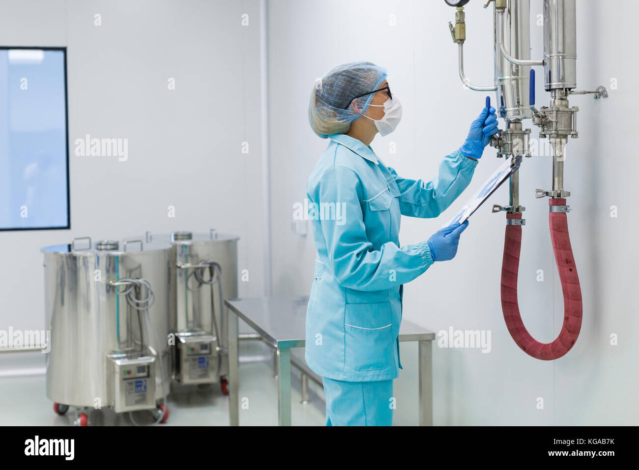 the operator checks the equipment for the production of sterile Stock ...