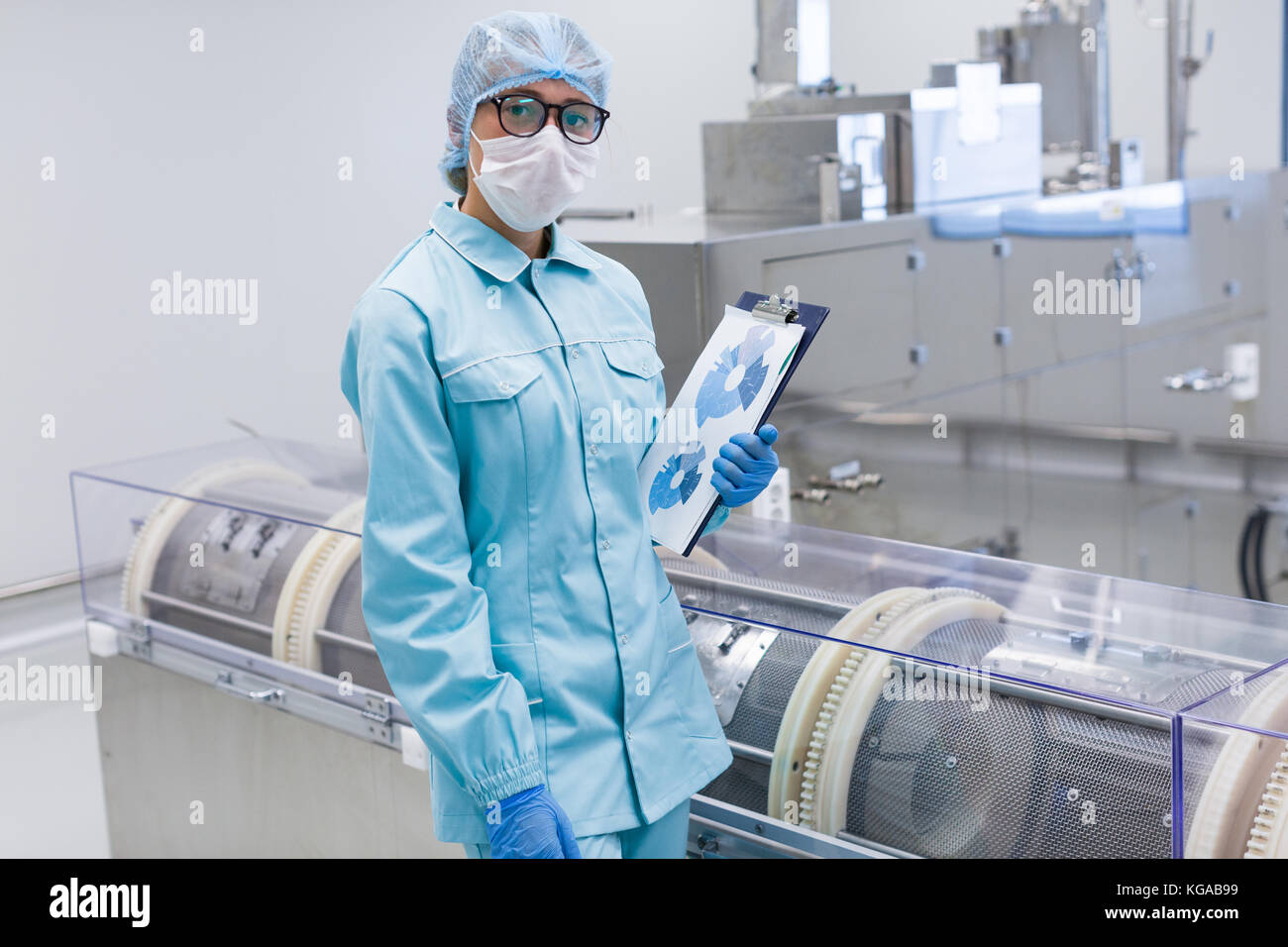 Inspector in the production control process Stock Photo - Alamy
