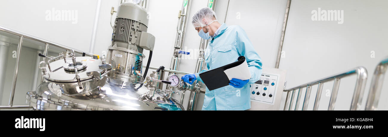 scientist is working with control panel Stock Photo - Alamy