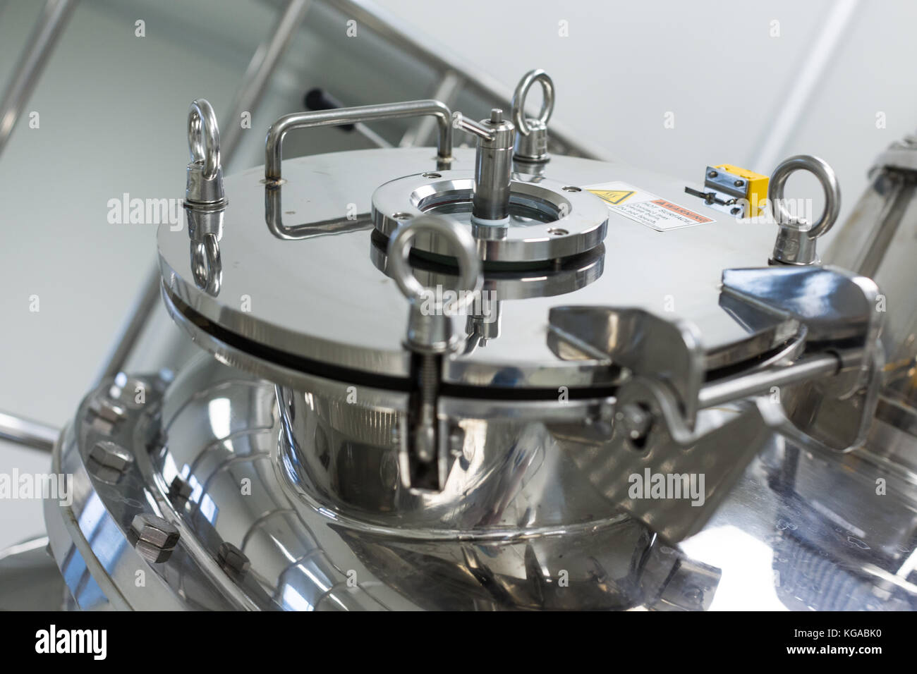 compression car on a big steel tank Stock Photo - Alamy