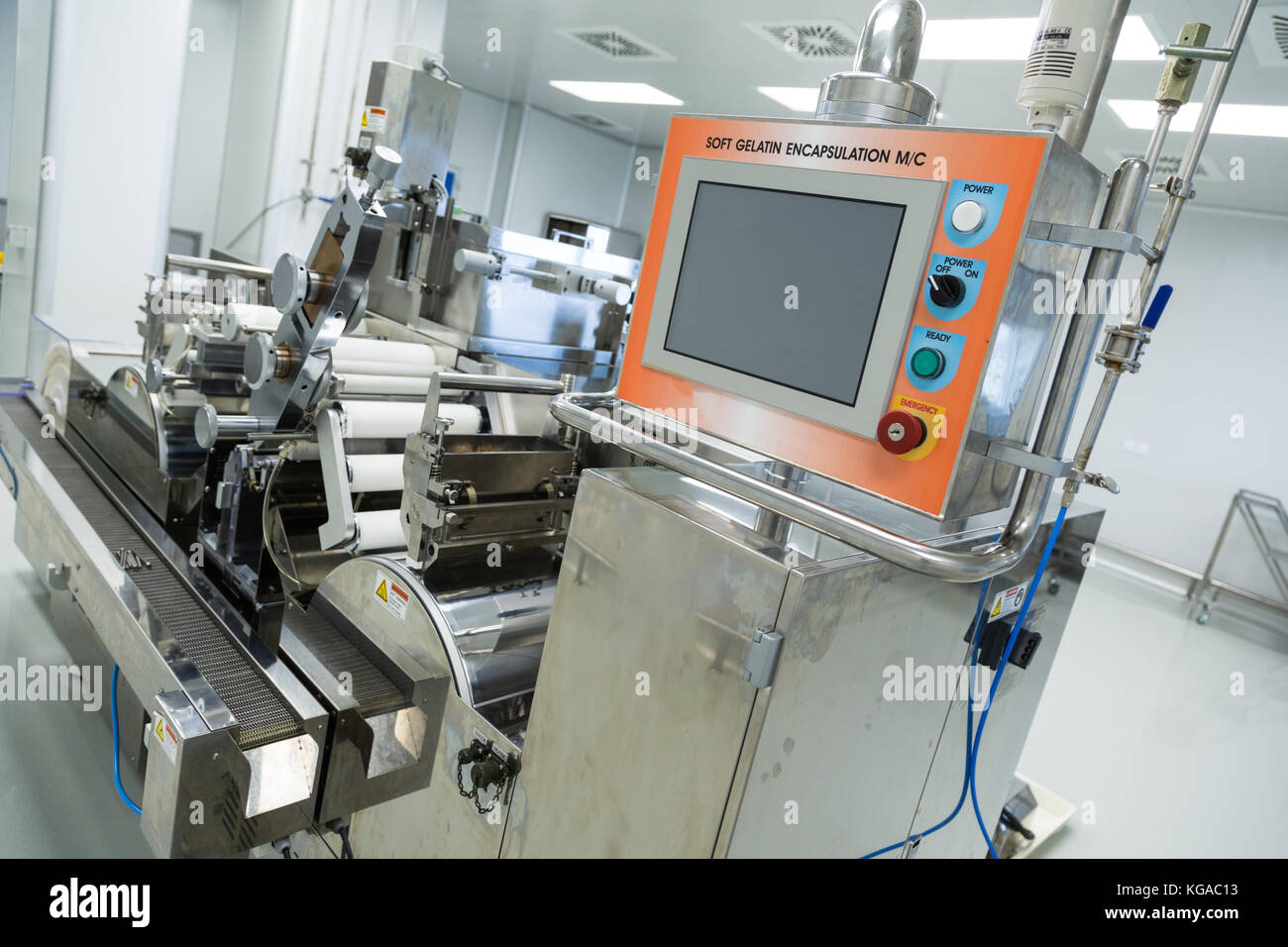 big steel machine with shafts and control panel Stock Photo - Alamy
