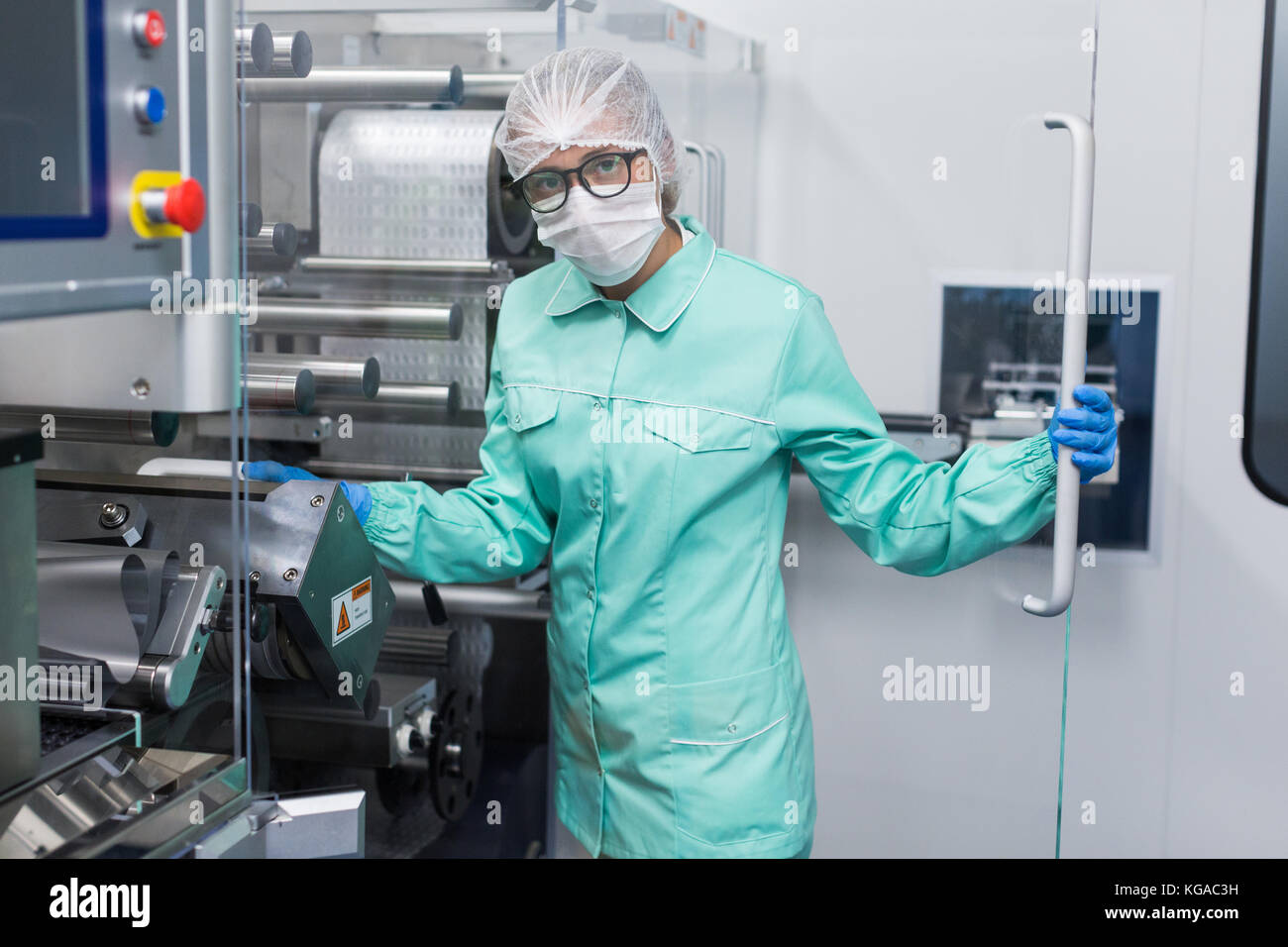 factory worker work with machine Stock Photo - Alamy