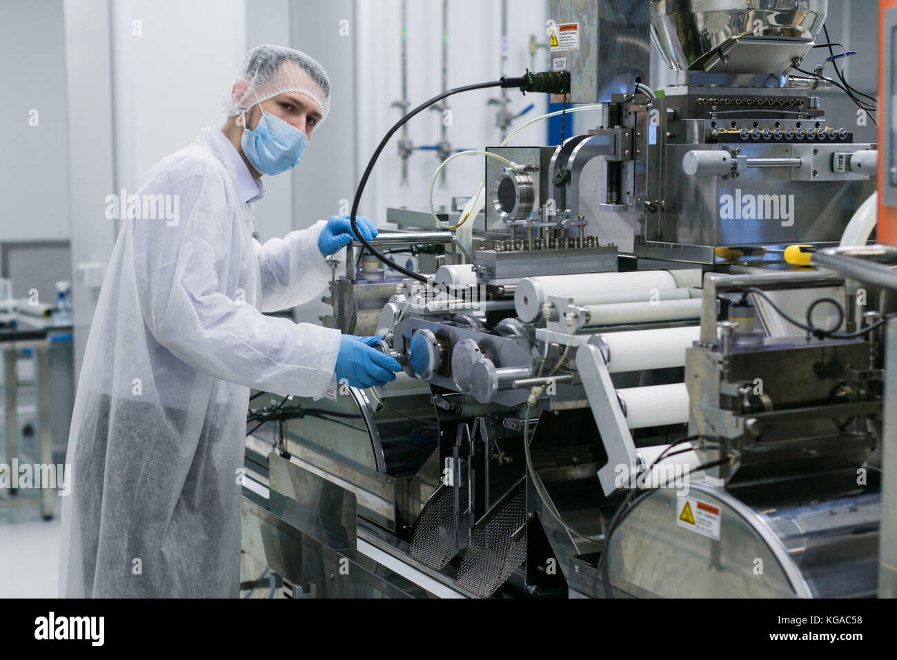scientist work with manufacture machine Stock Photo - Alamy