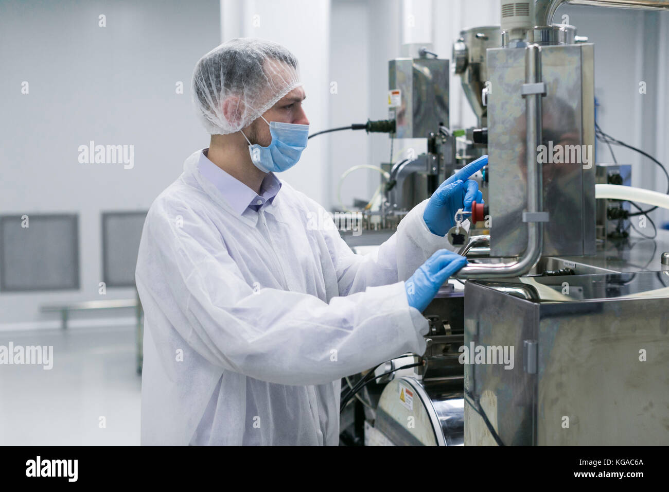 plant picture, scientist configures control panel Stock Photo - Alamy