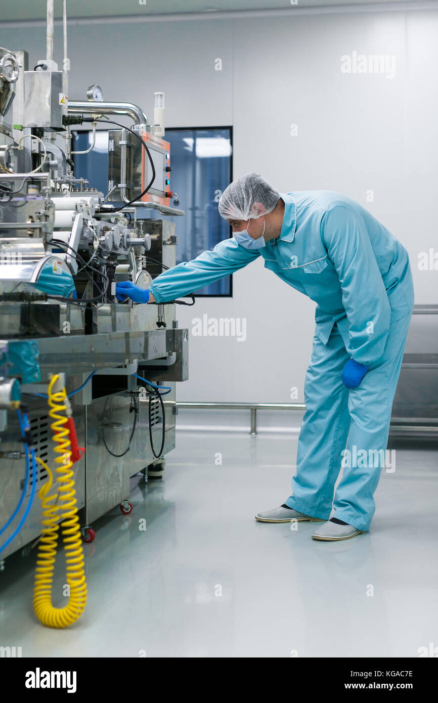 scientist fix machine with shafts Stock Photo - Alamy