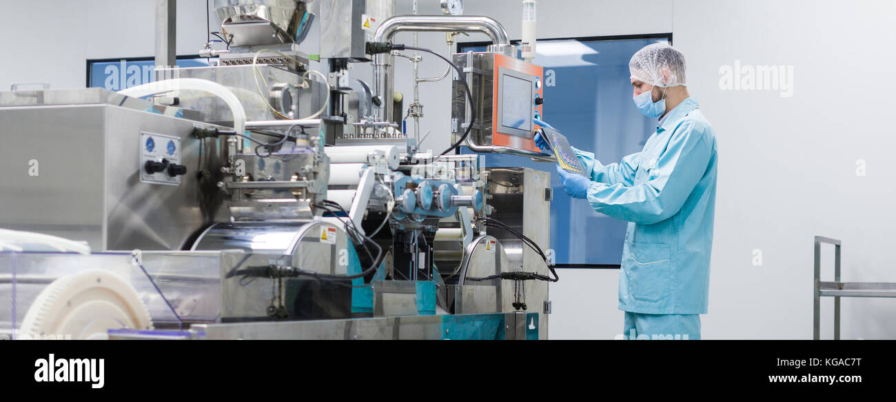 scientist fix machine with shafts Stock Photo - Alamy