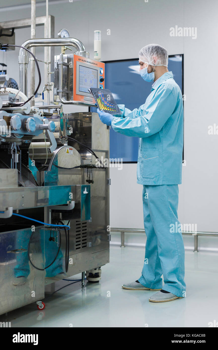 scientist work with machine with shafts Stock Photo - Alamy