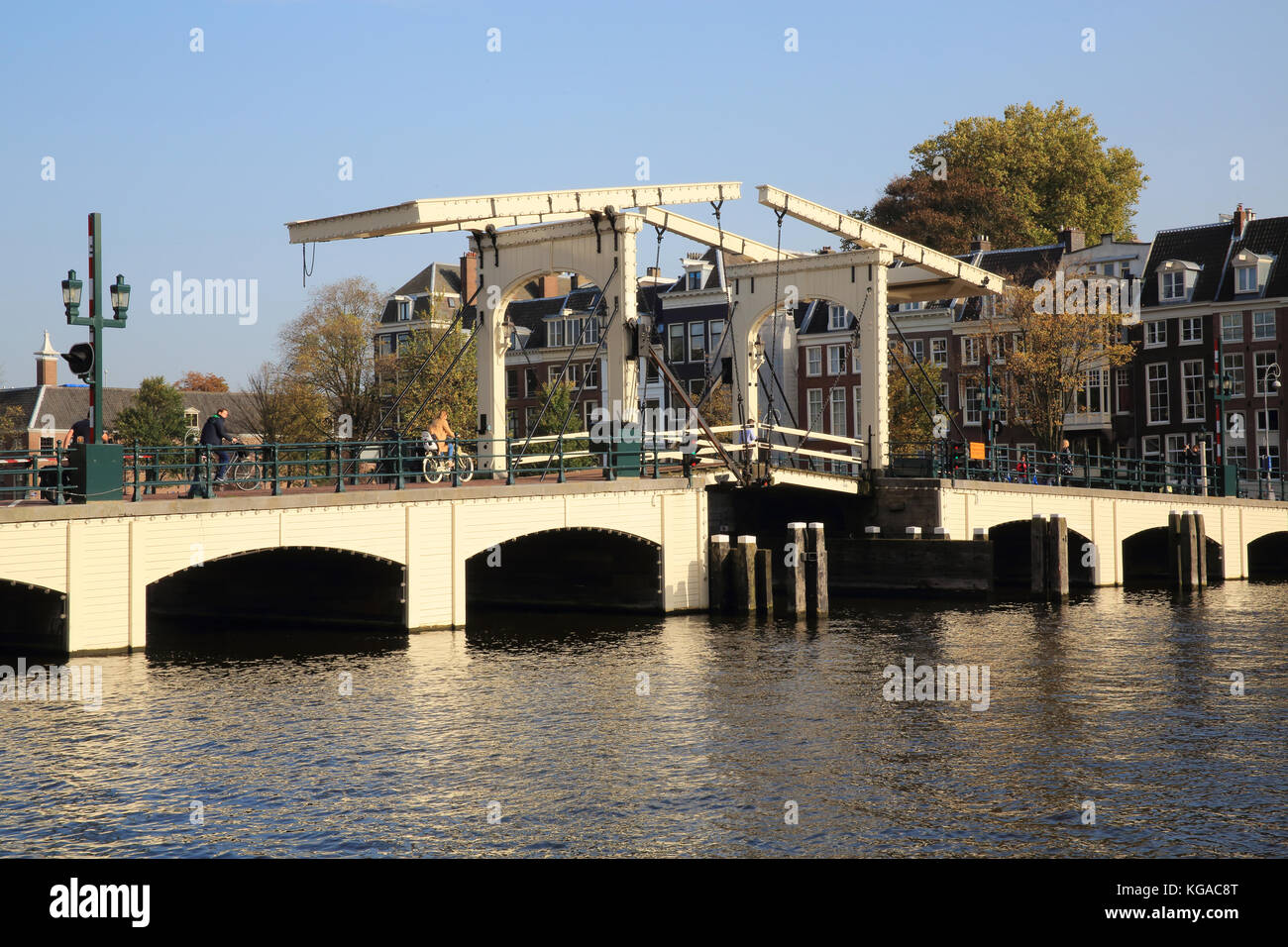 Magere Brug, or the Skinny Bridge, in the Autumn sunshine, in Amsterdam ...