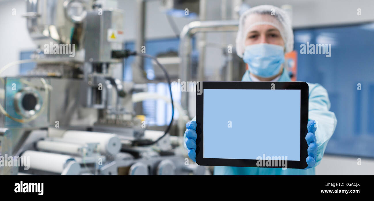 scientist configure stand with empty tablet Stock Photo - Alamy