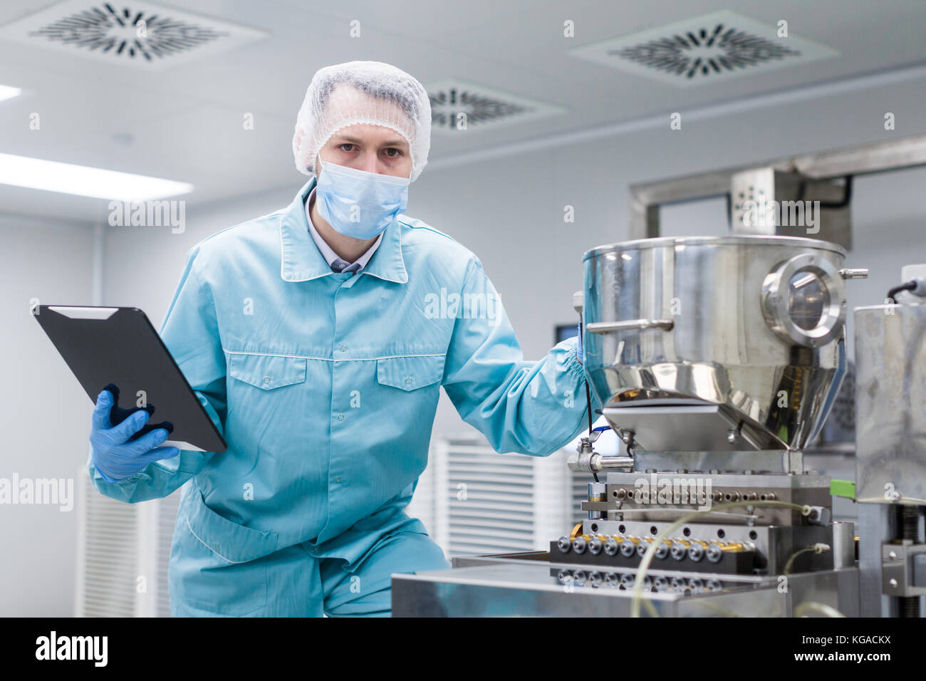 scientist work with big metal machine Stock Photo - Alamy