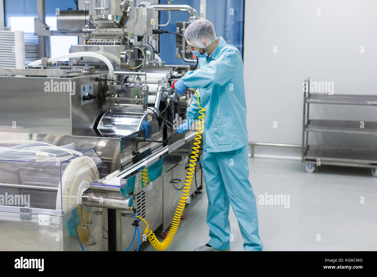 scientist configure machine with shafts Stock Photo - Alamy