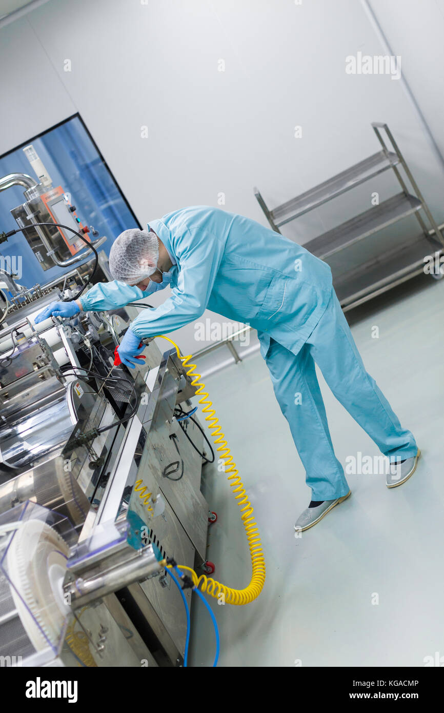 scientist configure machine with shafts Stock Photo - Alamy