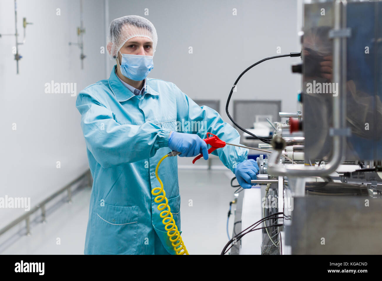 scientist configure machine with shafts Stock Photo - Alamy