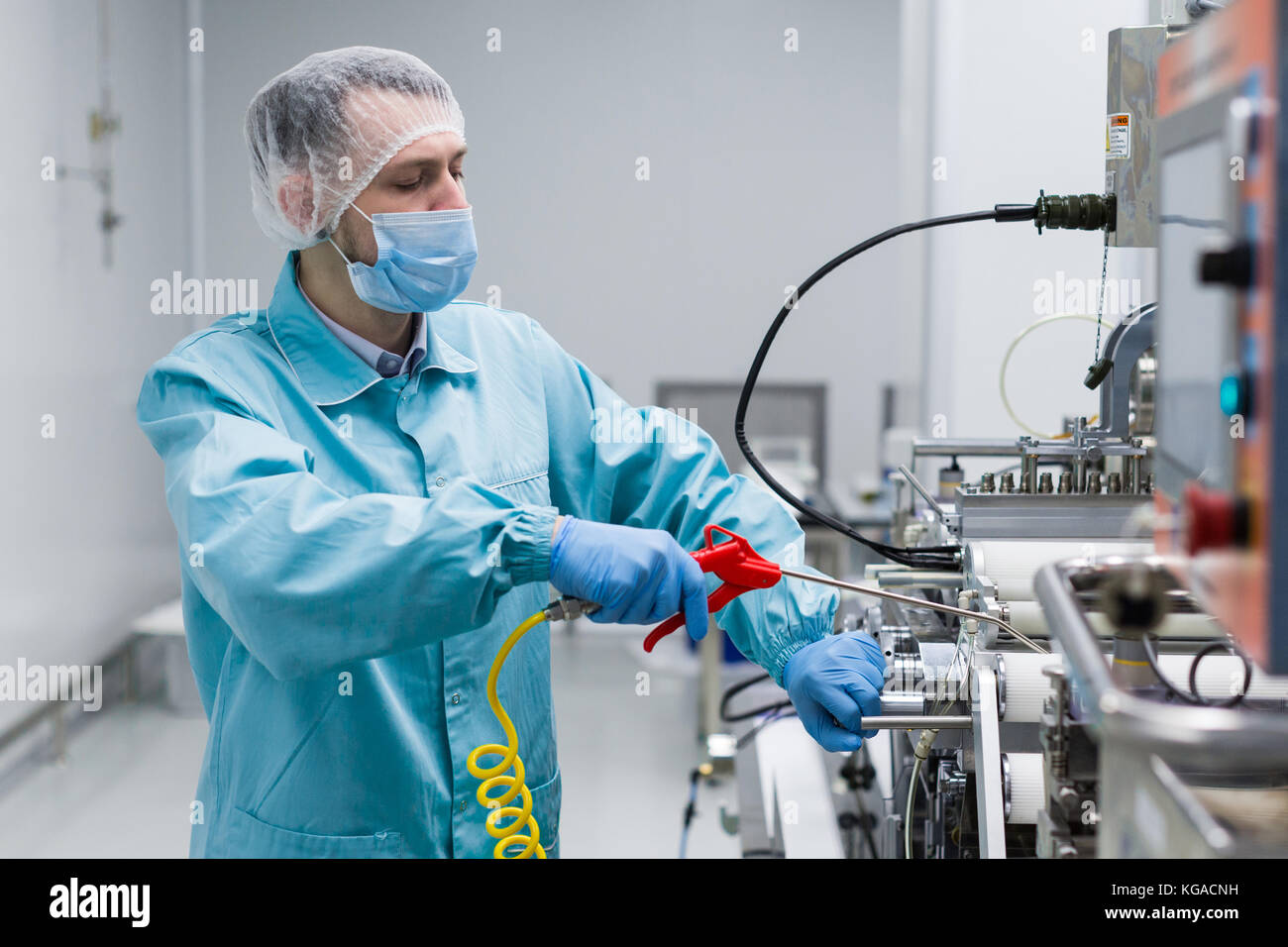 scientist configure machine with shafts Stock Photo - Alamy