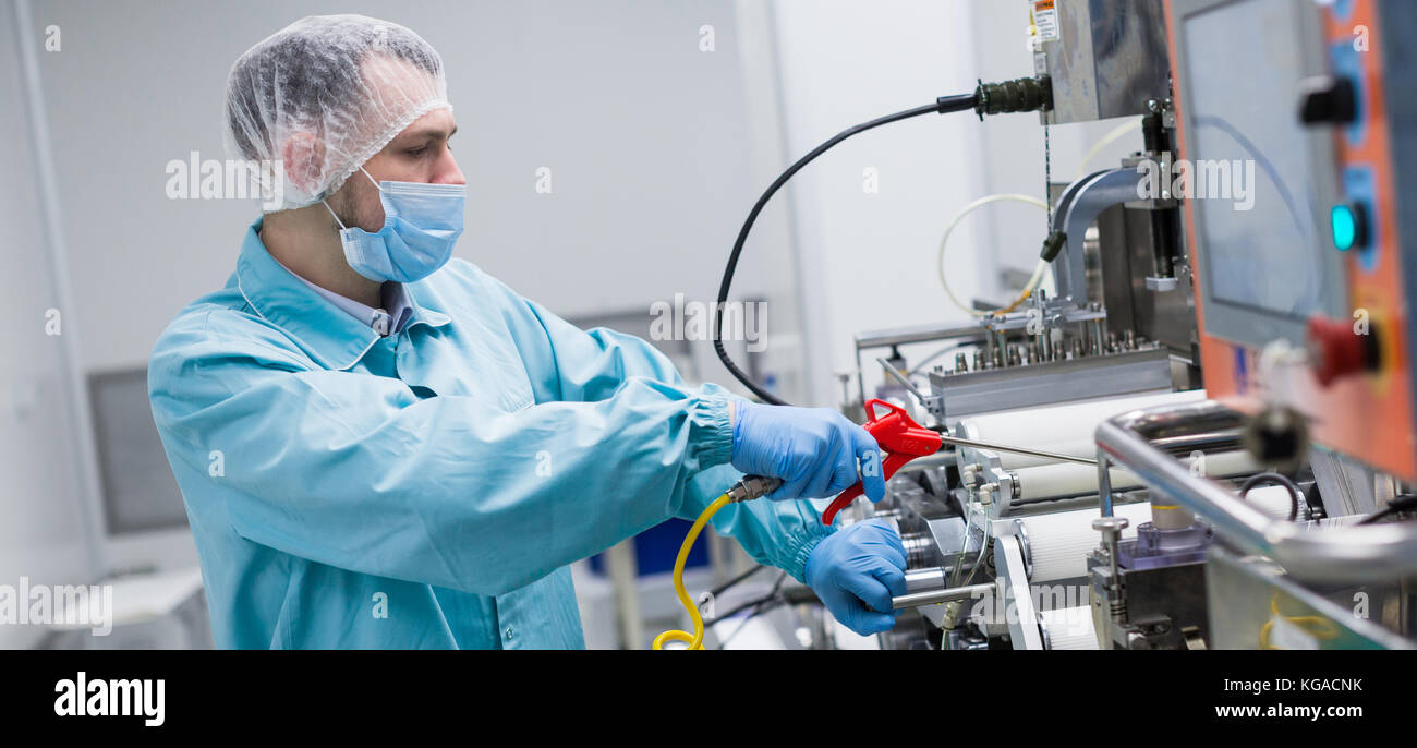 scientist configure machine with shafts Stock Photo - Alamy