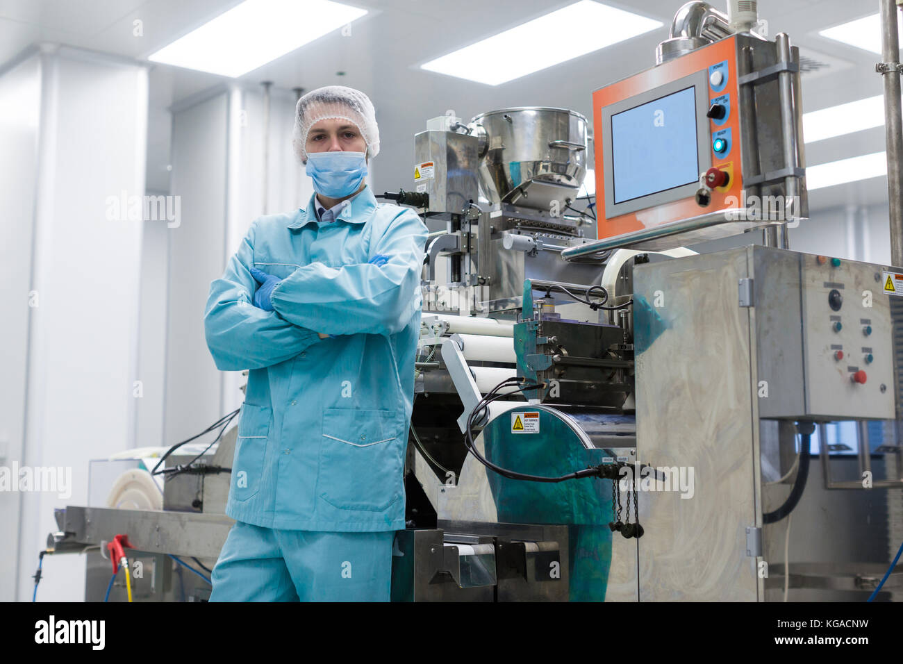 scientist stand near control panel Stock Photo - Alamy