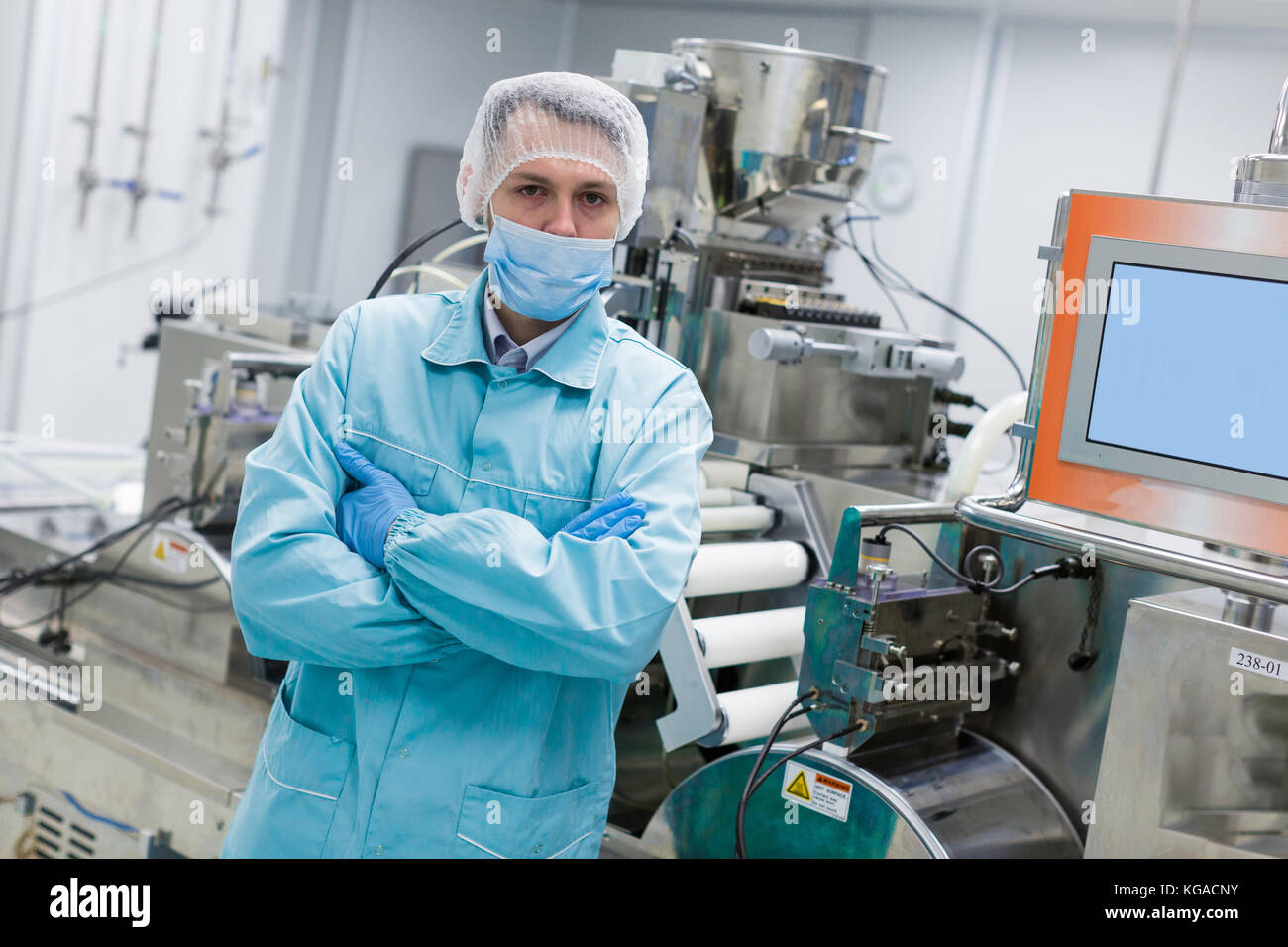 scientist stand near control panel Stock Photo - Alamy