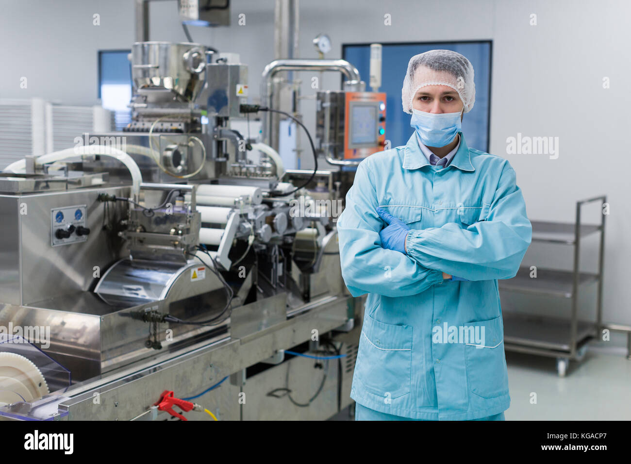 scientist stand near control panel Stock Photo - Alamy